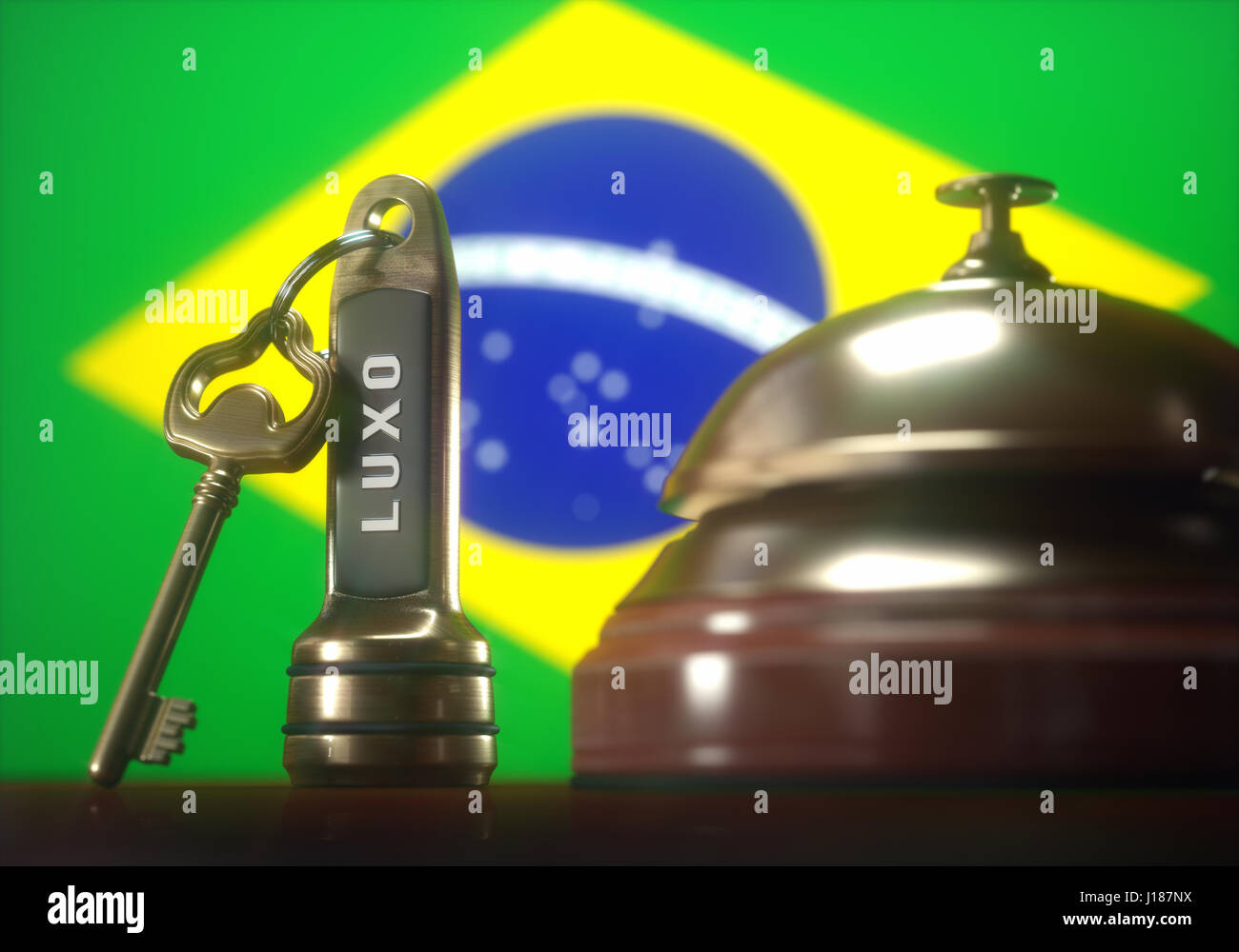 Luxury hotel key and vintage golden bell of the Brazil on the wooden ...