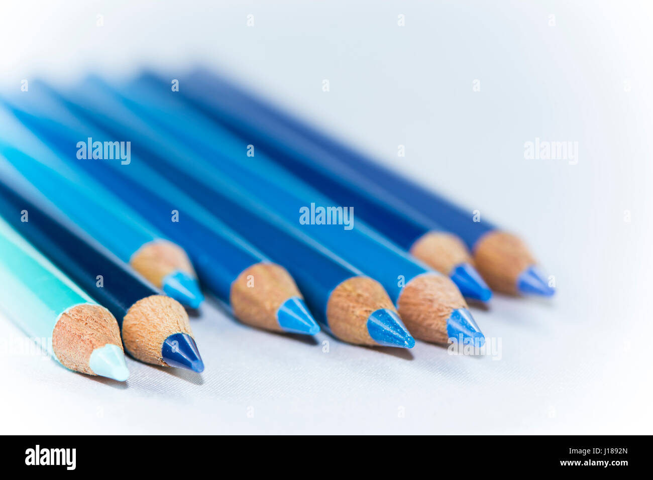 Different shades of blue pencils hi-res stock photography and images ...
