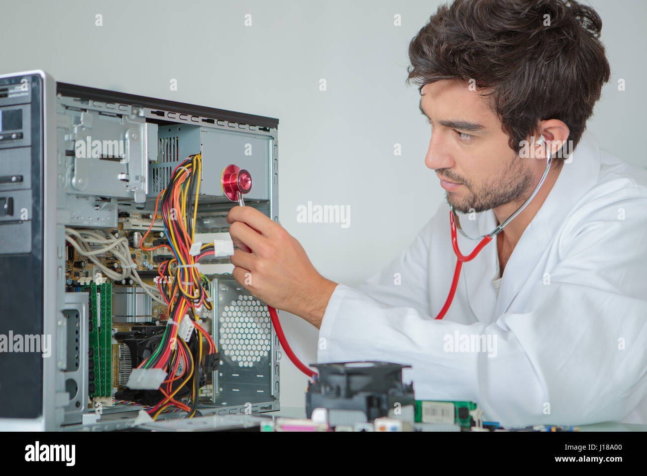 man fixing a CPU Stock Photo - Alamy