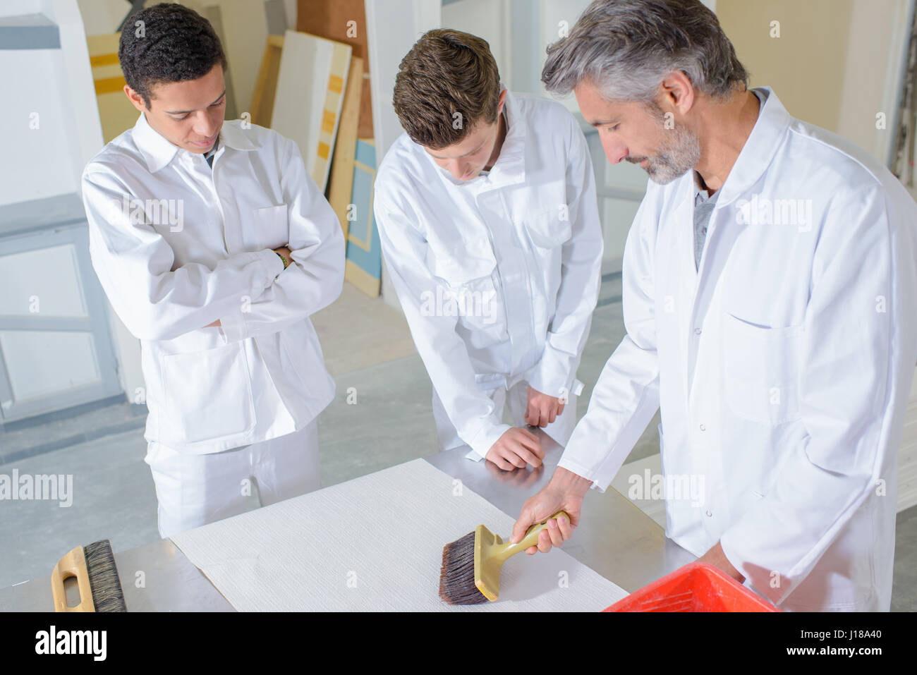 Three young men show hi-res stock photography and images - Alamy