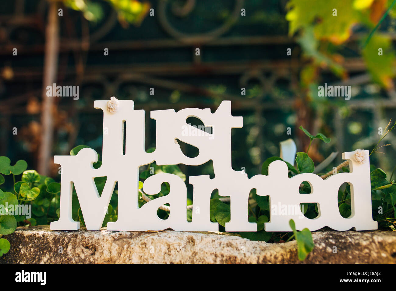 Wooden just married Stock Photo - Alamy