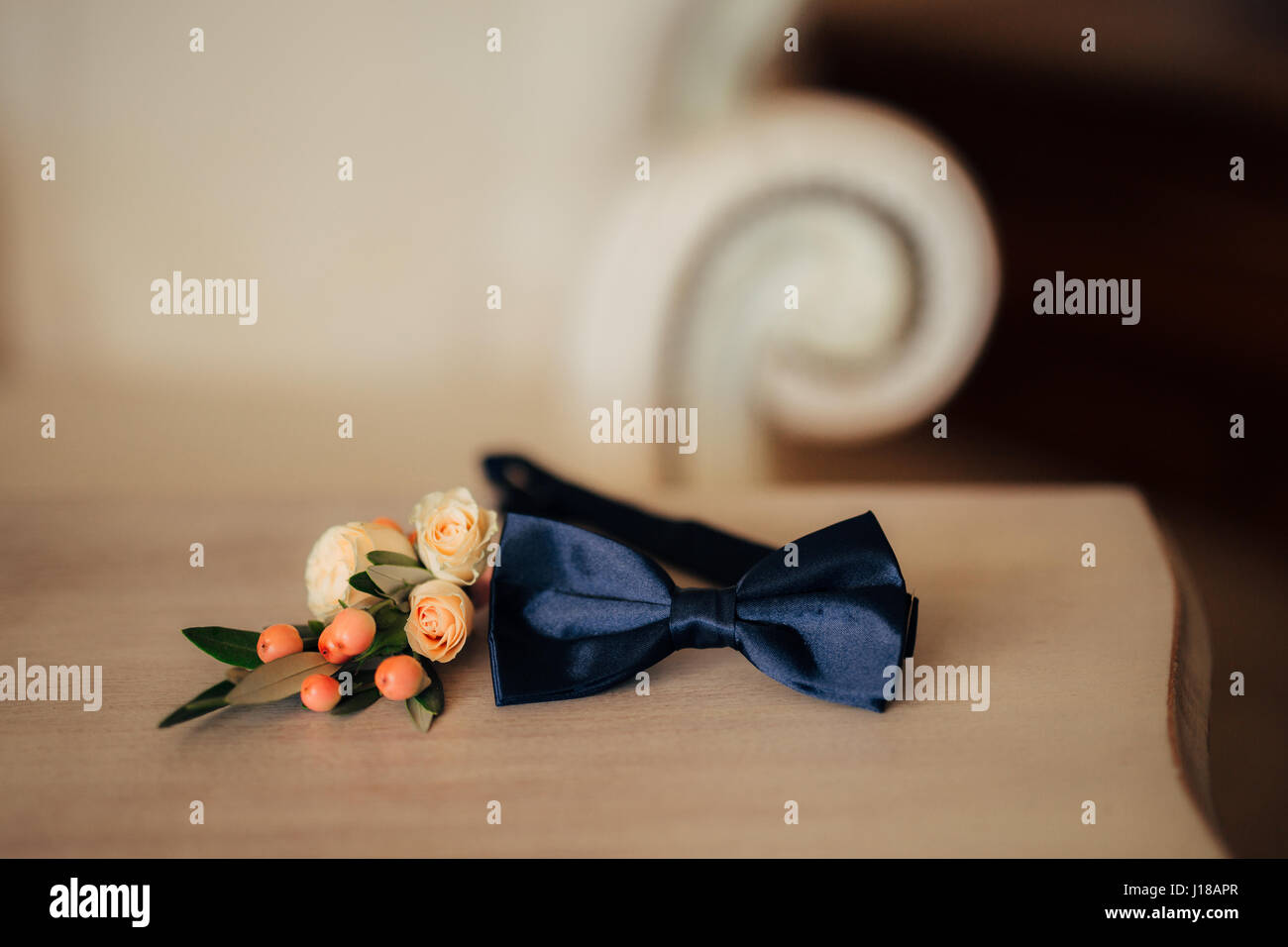 Bow tie and boutonniere Stock Photo - Alamy