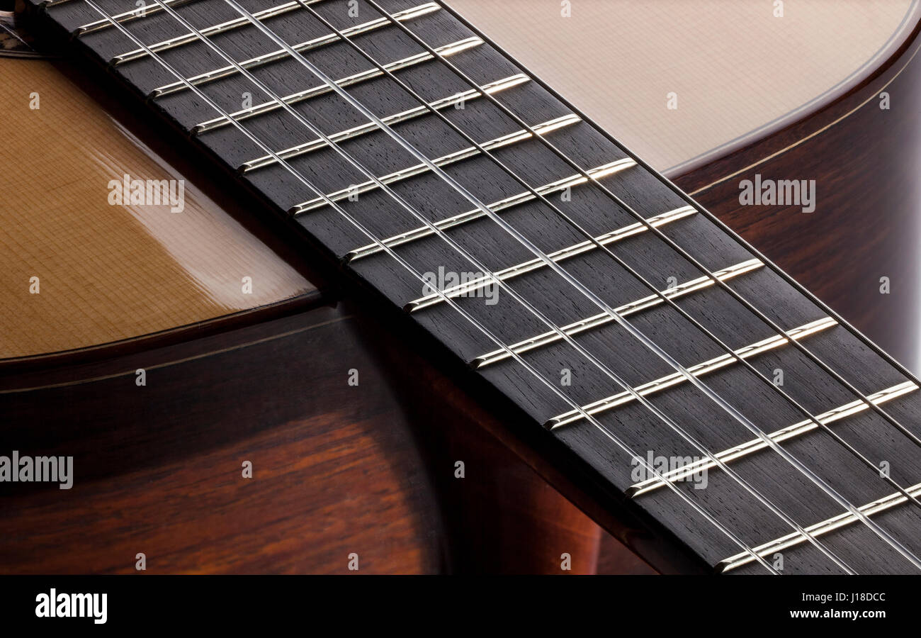 Details of a classic wooden guitar with strings Stock Photo - Alamy