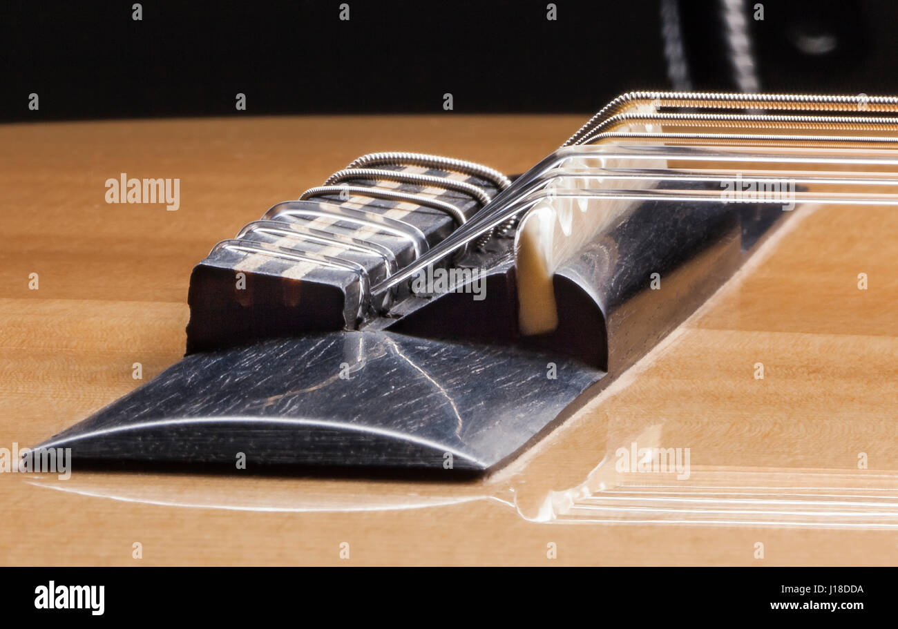 Details of a classic wooden guitar with strings Stock Photo - Alamy
