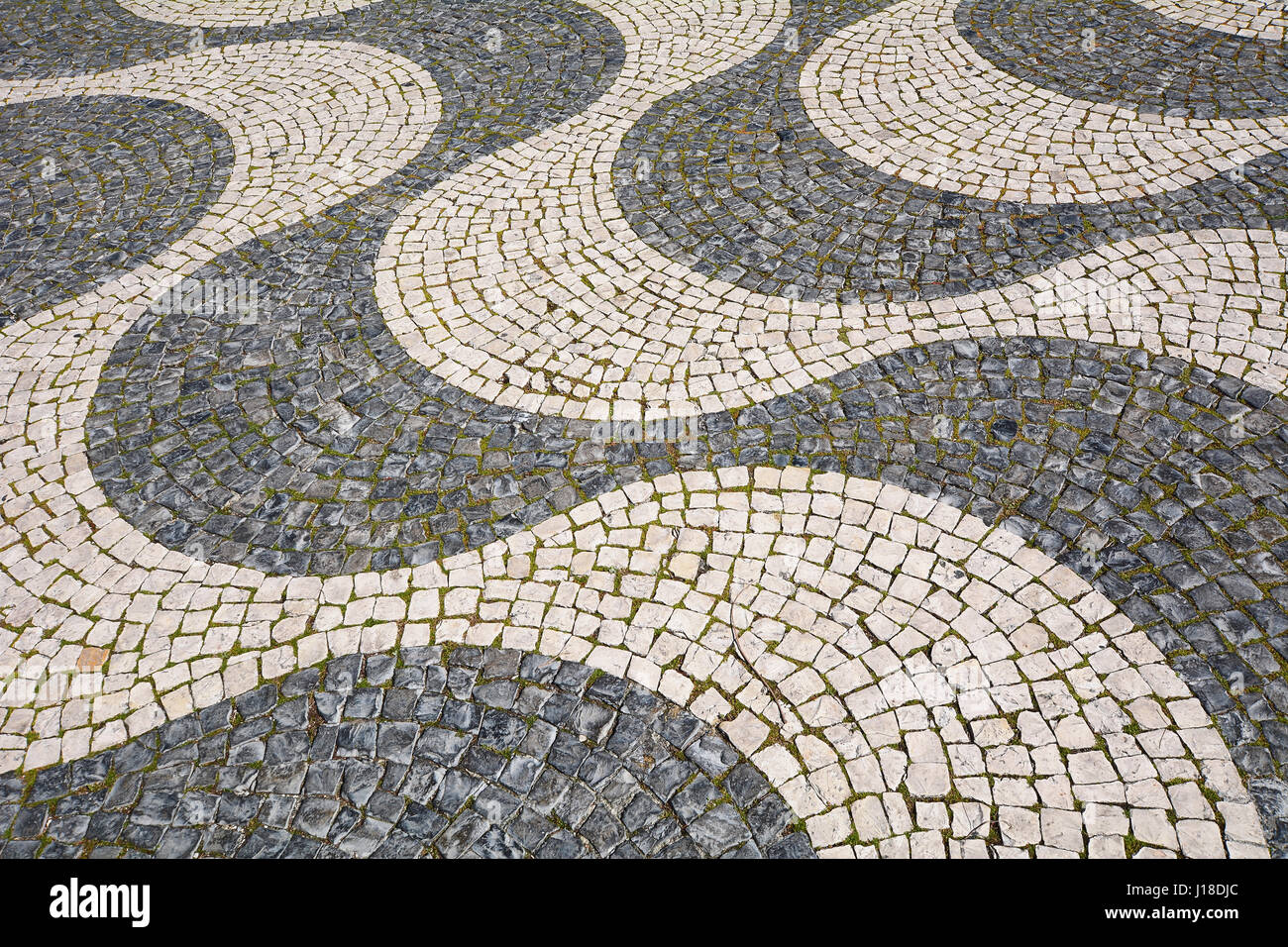 Detail of a typical portuguese cobblestone hand made pavement - Lisbon ...