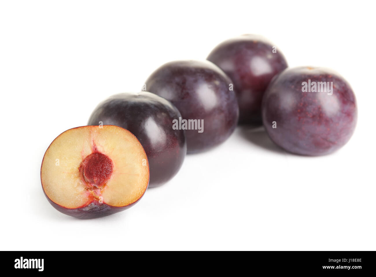 Plum fruit isolated on white background Stock Photo - Alamy