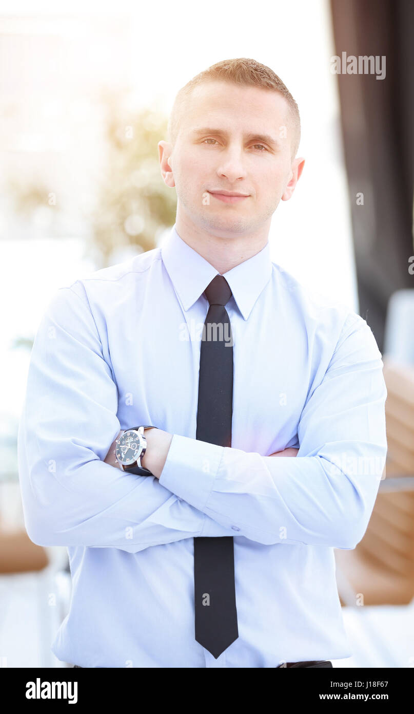 Close up portrait of an attractive young businessman smiling Stock ...