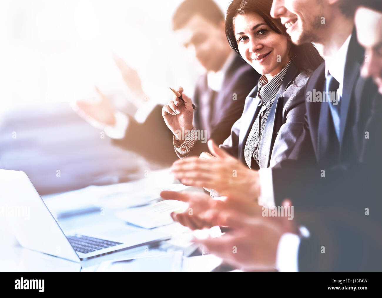 Close up view of business seminar listeners clapping hands ...