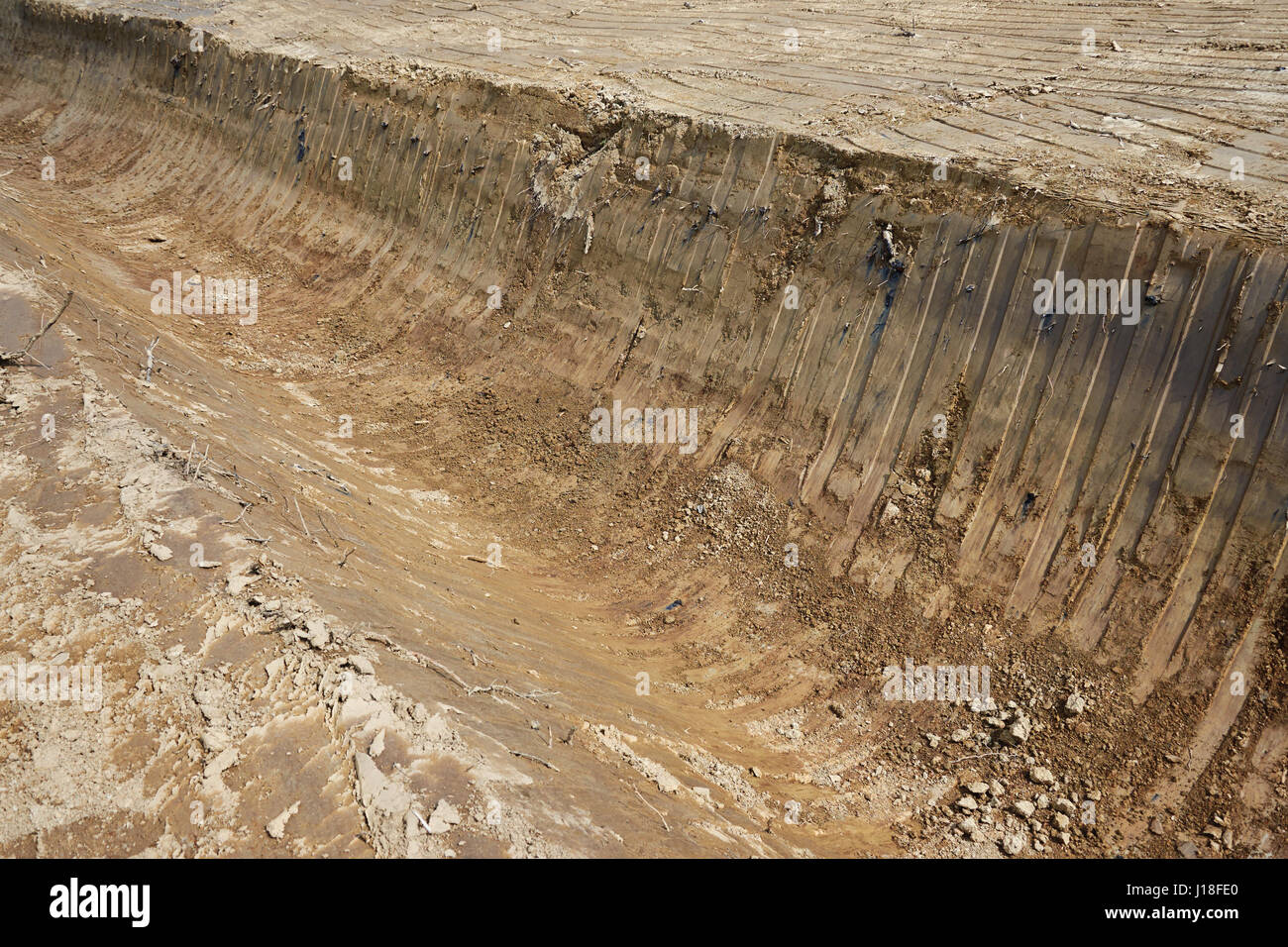Close up of Earth pattern, vertical lines Close up of dry clay pattern ...