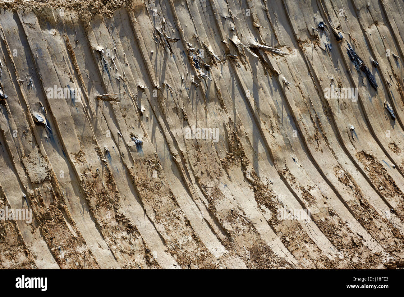 Close up of Earth pattern, vertical lines Close up of dry clay pattern ...