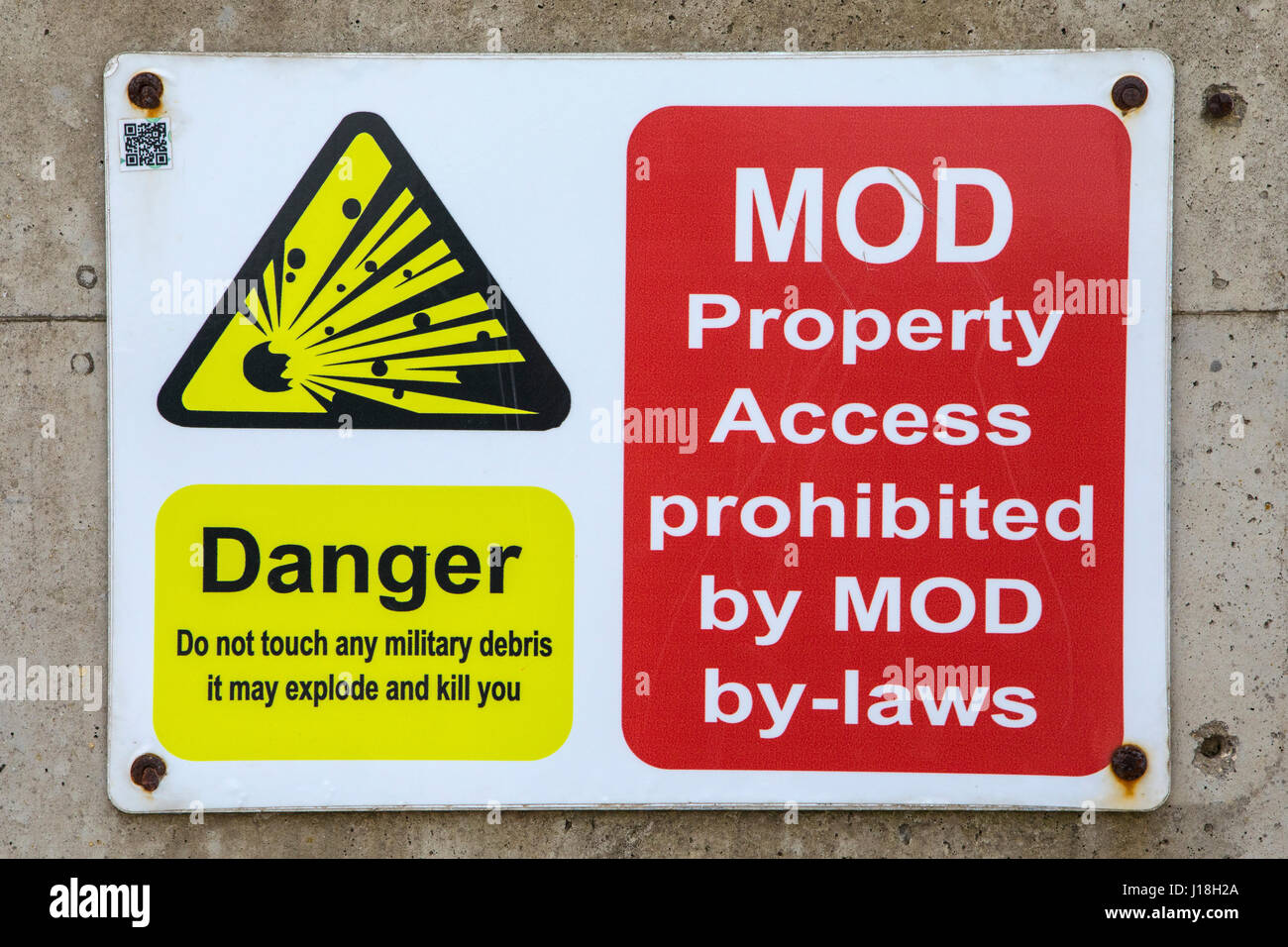 A danger sign warning people that access is prohibited due to possible ...