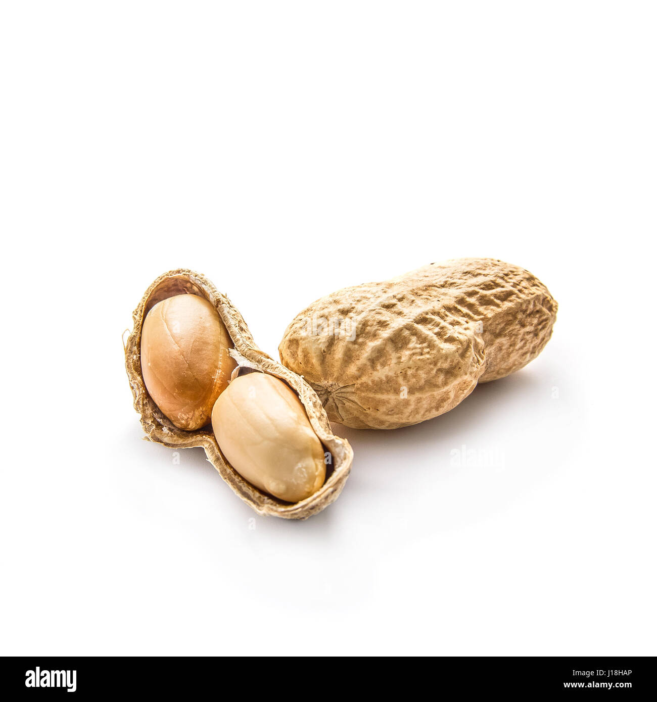 Peanuts in shell on white background Stock Photo - Alamy