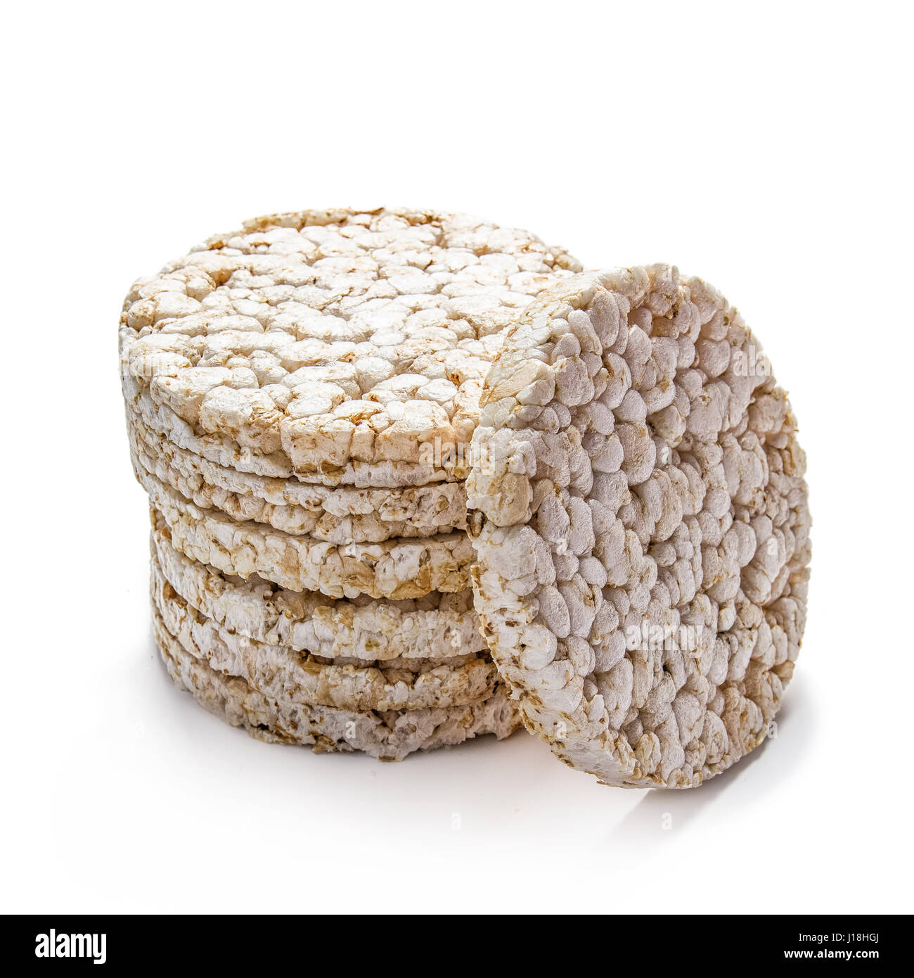 Pile of rice crackers on wite background Stock Photo - Alamy
