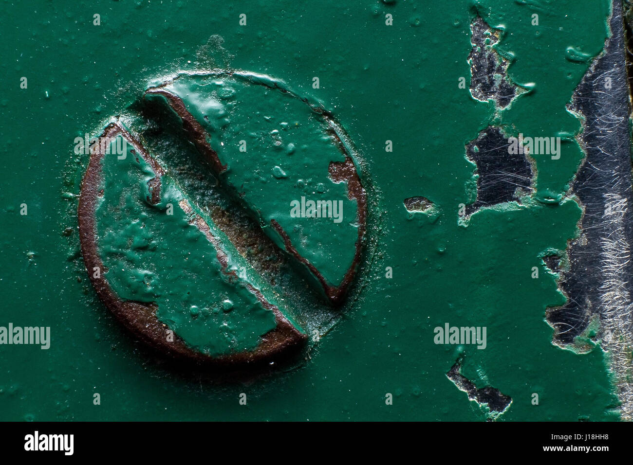 Background of a green painted rusty screw Stock Photo - Alamy