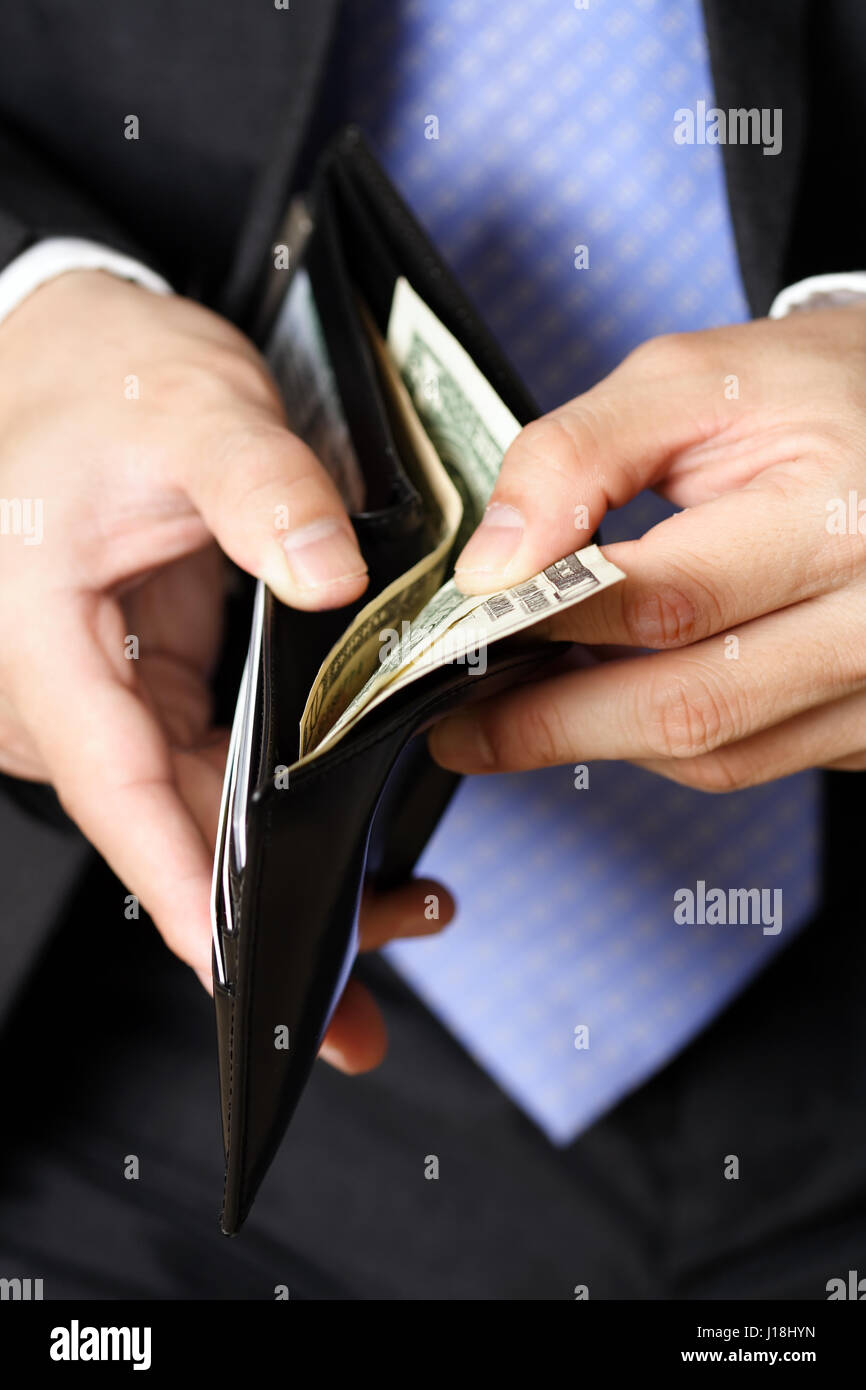 Taking money out of an atm hi-res stock photography and images - Alamy