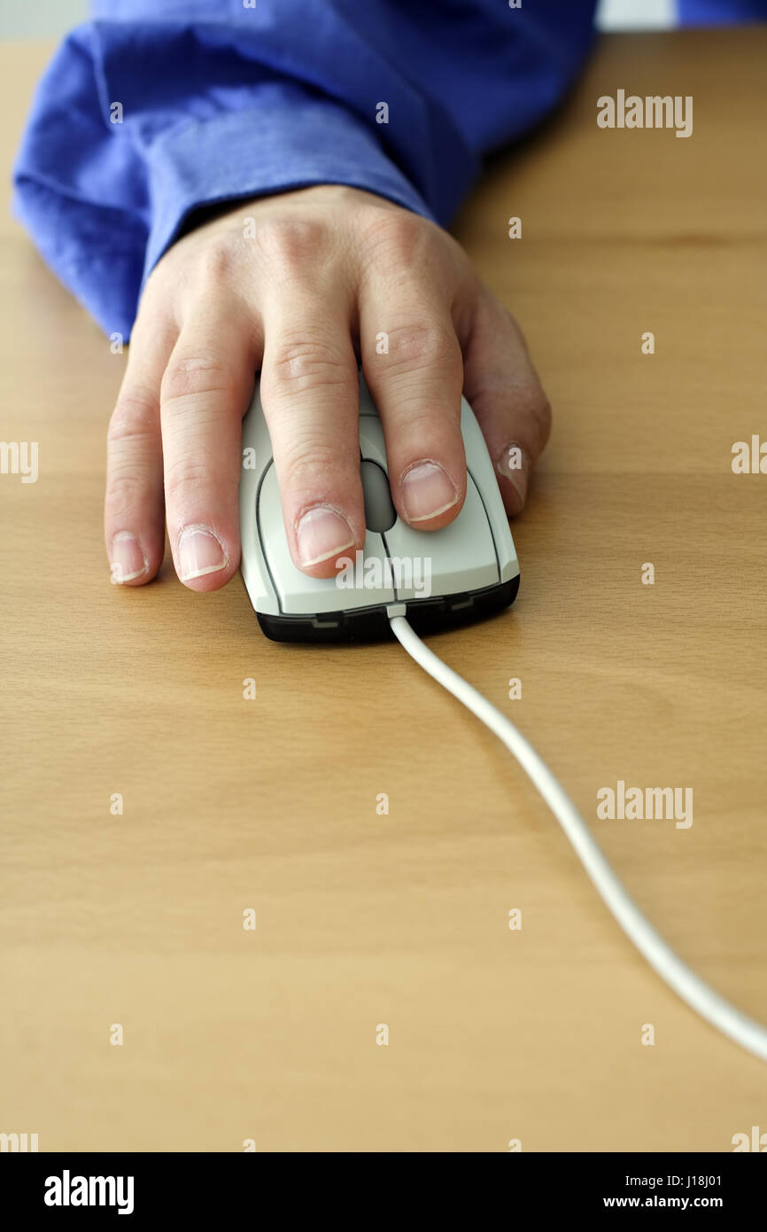 A businessman using a mouse Stock Photo - Alamy