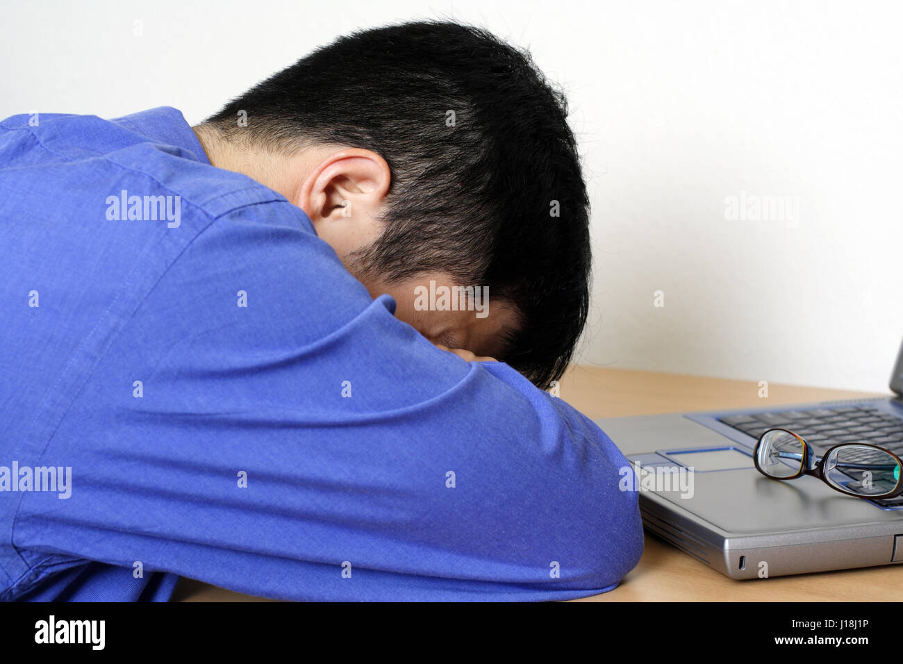 Stressed out and tired businessman Stock Photo - Alamy