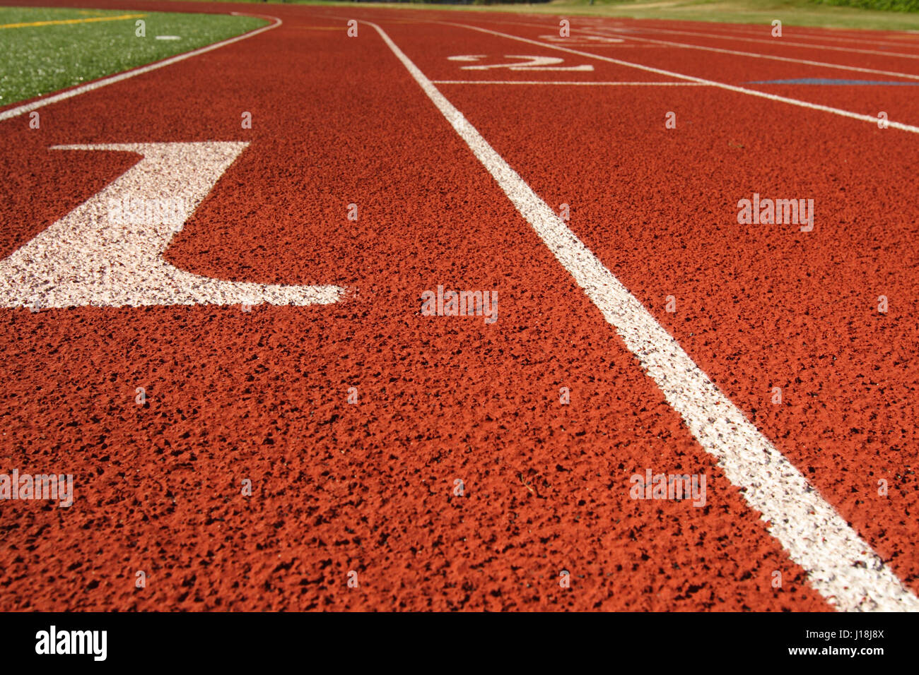 Start line in a running track Stock Photo - Alamy