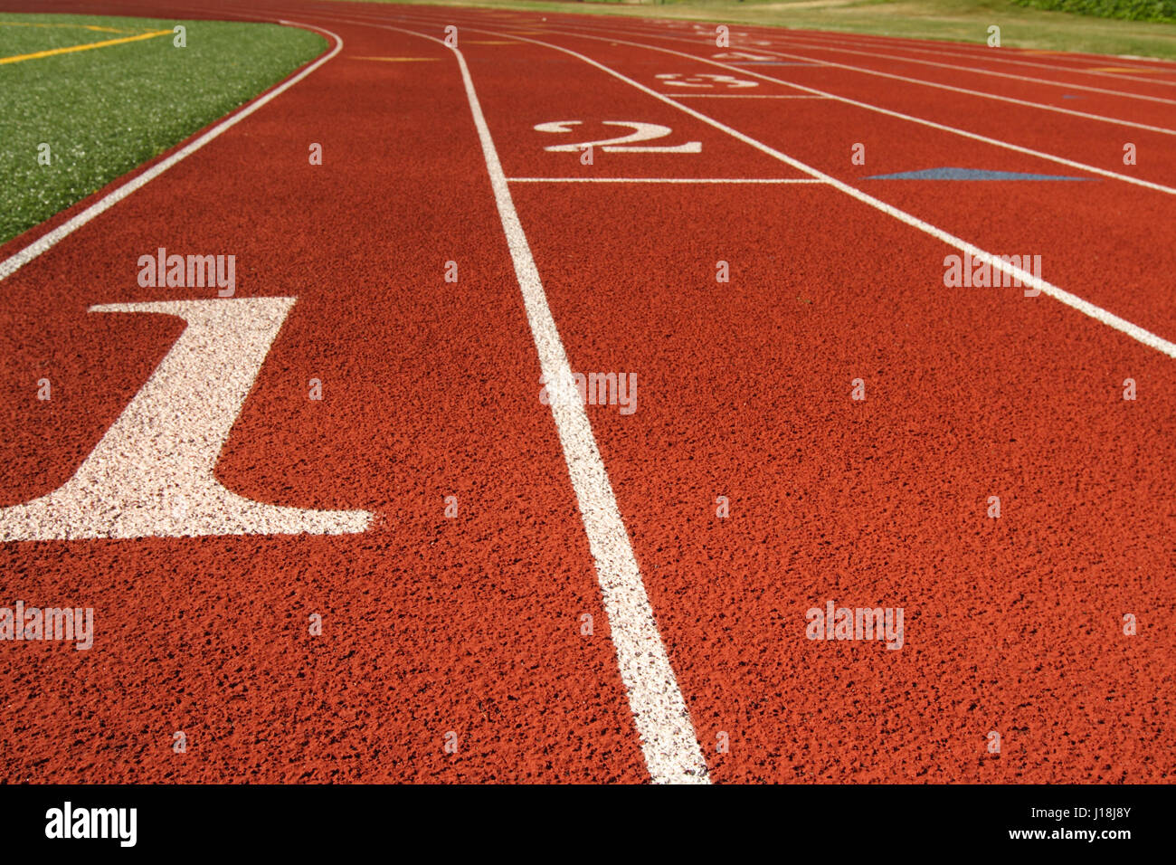 Start line in a running track Stock Photo - Alamy