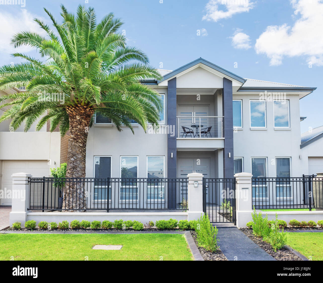typical facade of a modern suburban house at noon Stock Photo - Alamy