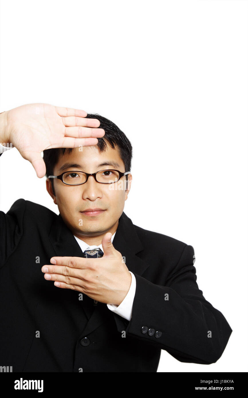 A businessman doing hand frame Stock Photo - Alamy