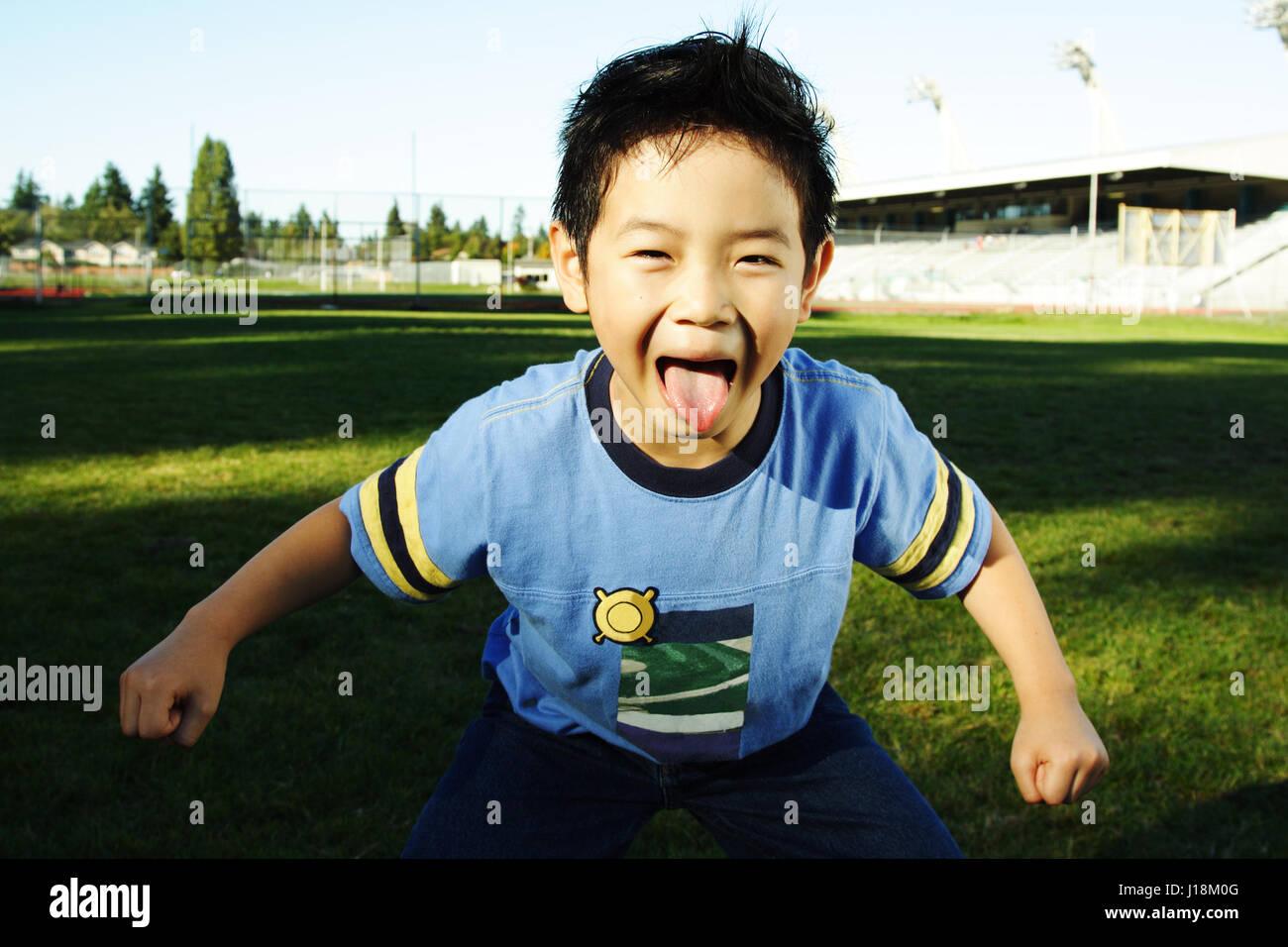 A happy boy with funny expression Stock Photo - Alamy