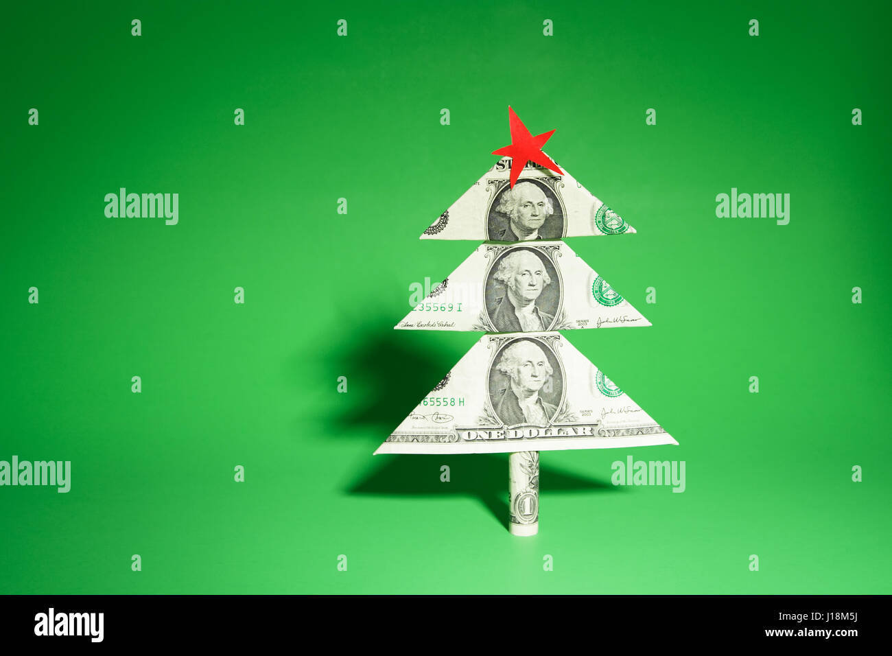 Christmas tree made of one dollar bills Stock Photo - Alamy
