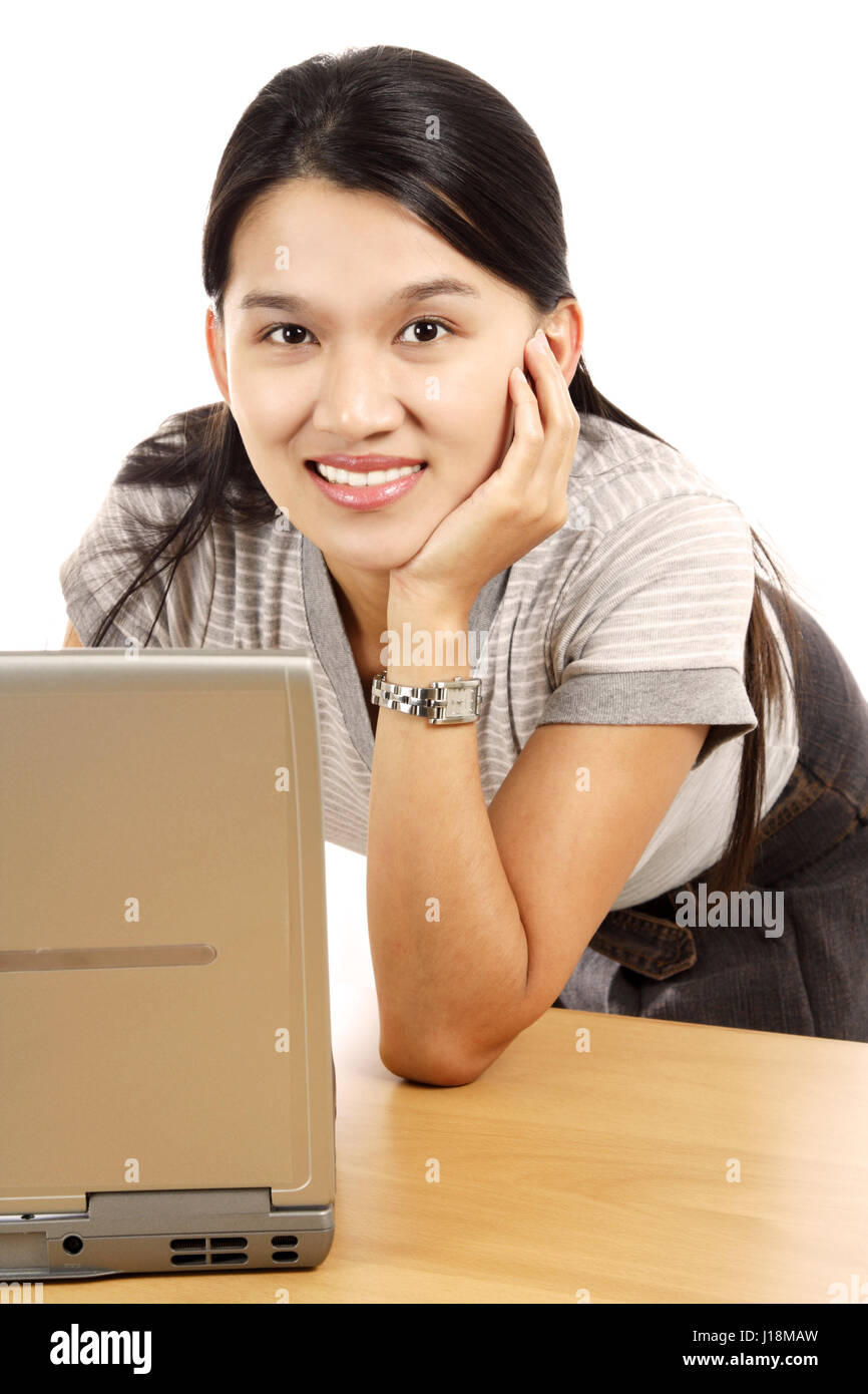 A pretty girl with a laptop (isolated white Stock Photo - Alamy