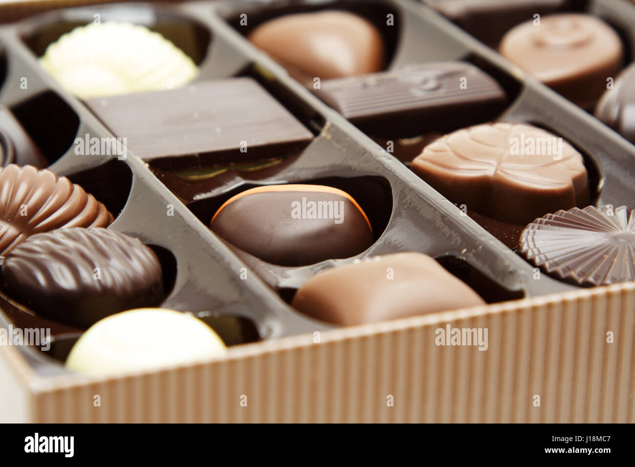 Different variety of chocolates in a box Stock Photo - Alamy