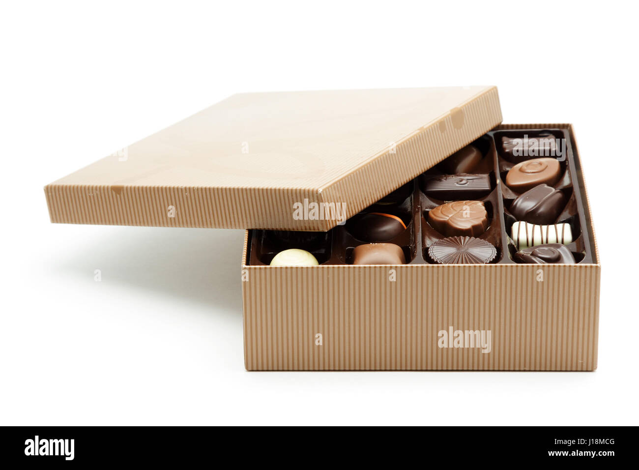 A box of chocolates with the lid opened Stock Photo - Alamy