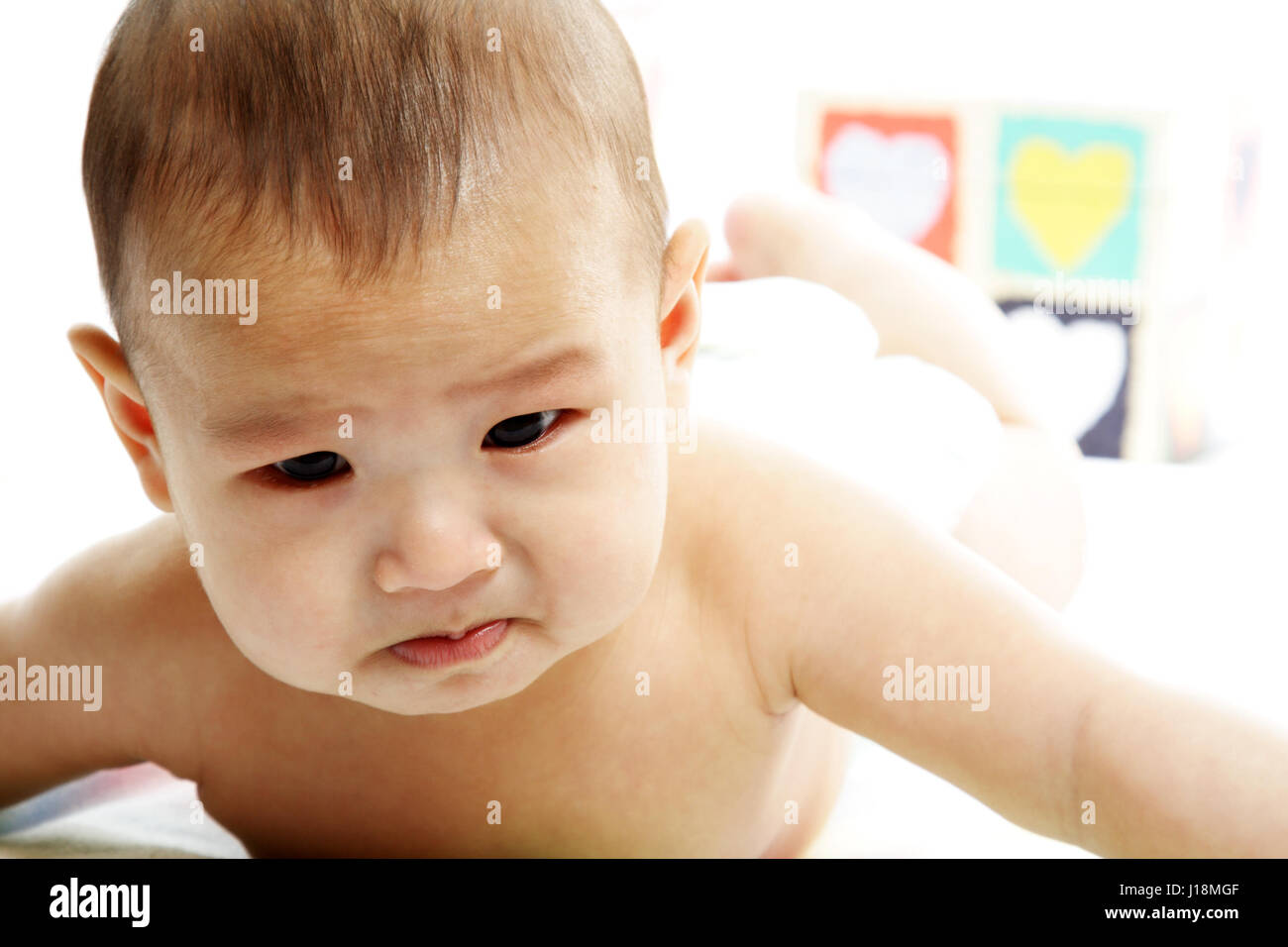 A portrait of a crying cute baby boy Stock Photo - Alamy