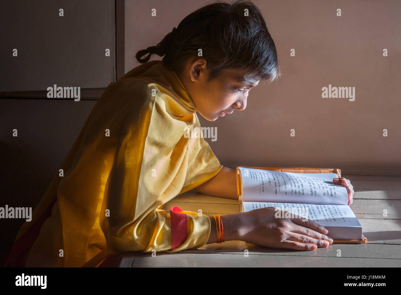Boy reading book, varanasi, uttar pradesh, india, asia Stock Photo - Alamy