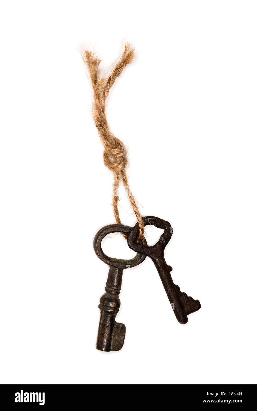 Bunch of old keys on a rope on white Stock Photo - Alamy