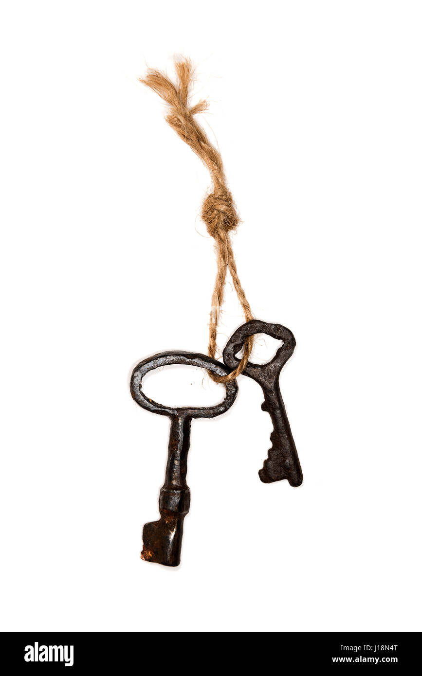 Bunch of old keys on a rope on white Stock Photo - Alamy