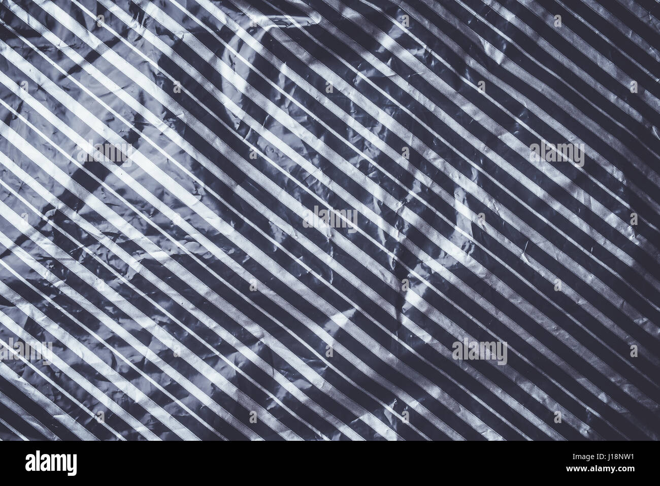 Striped shiny foil background hi-res stock photography and images - Alamy