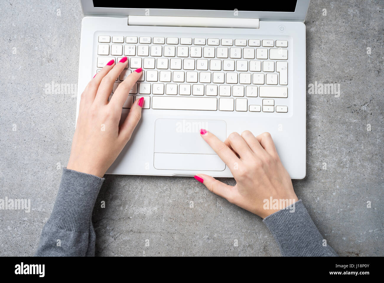 Woman working on computer Stock Photo - Alamy