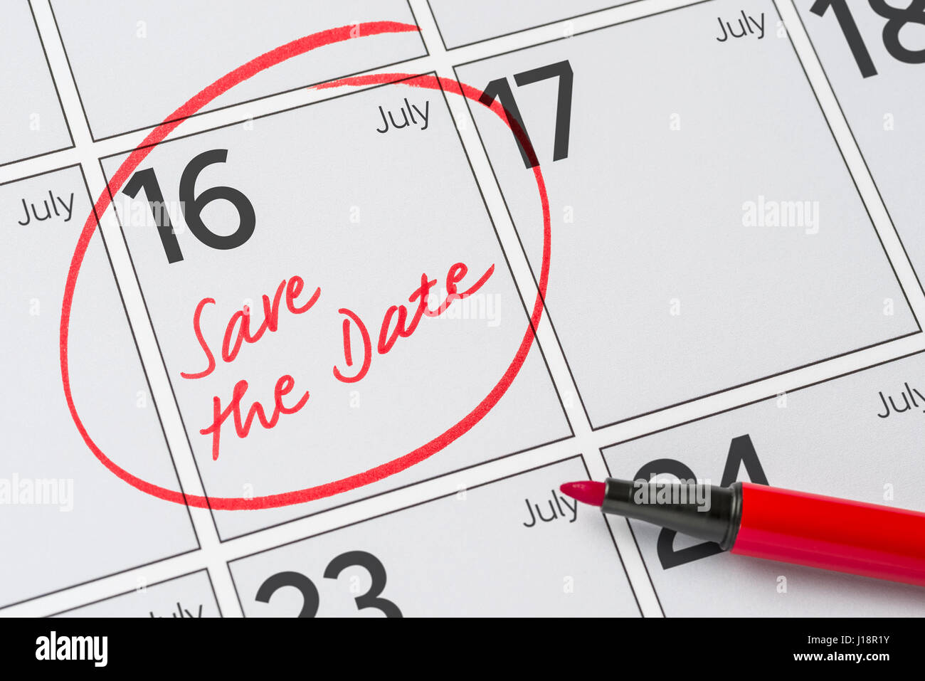 Save the Date written on a calendar - July 16 Stock Photo - Alamy