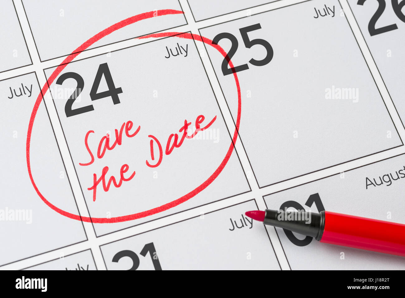 Save the Date written on a calendar - July 24 Stock Photo - Alamy