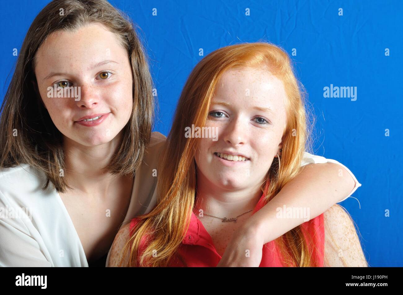 Complicity between two teens Stock Photo - Alamy
