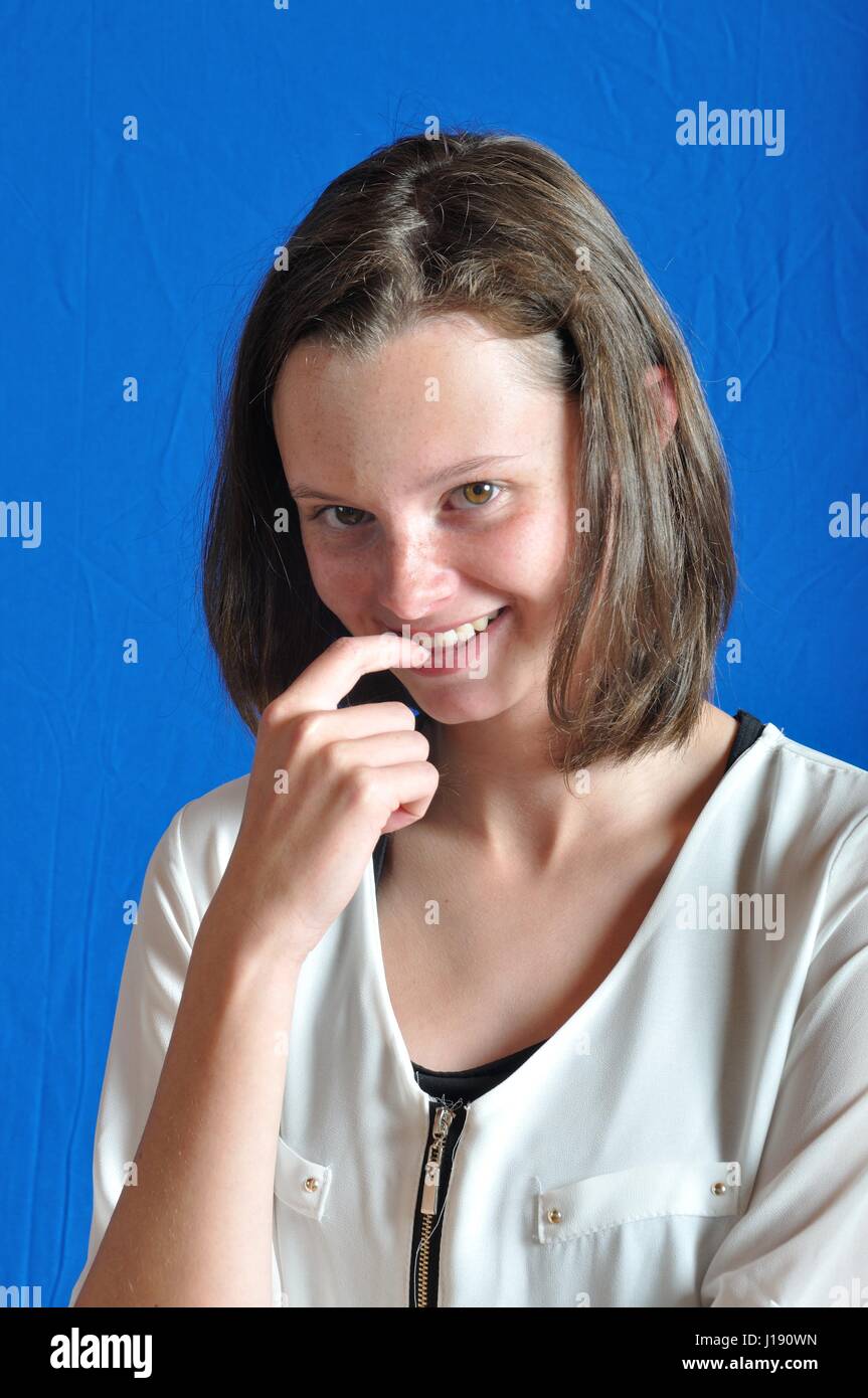 Teen playing the shy Stock Photo - Alamy