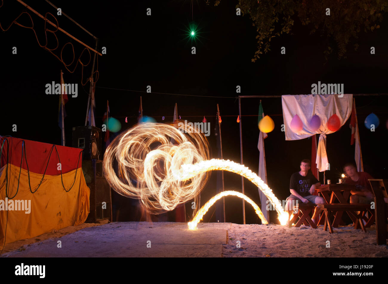 Man performing fire poi, Railay beach, Krabi, Thailand. Thai Dancer ...