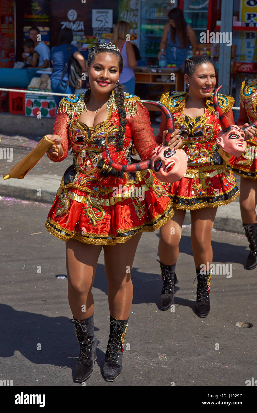 Young women performing the Diablada (dance of the devil) as part of the ...