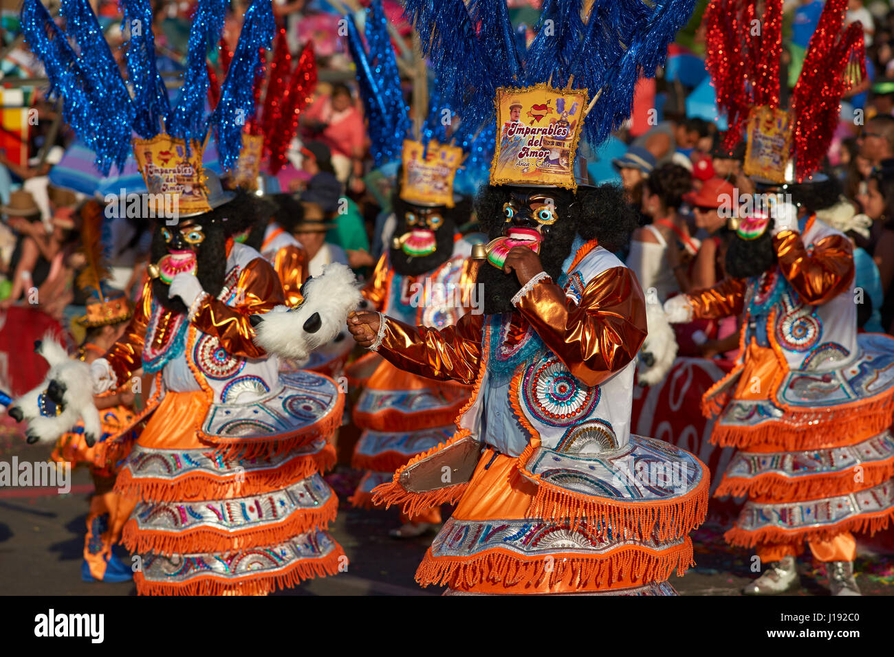 Morenada dance group in traditional Andean costume performing at the ...
