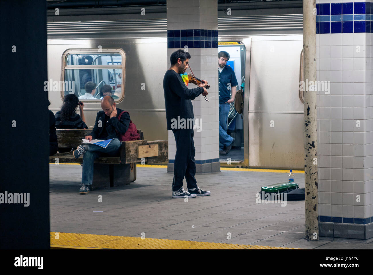 A musician plays in the subway in New York City Stock Photo - Alamy