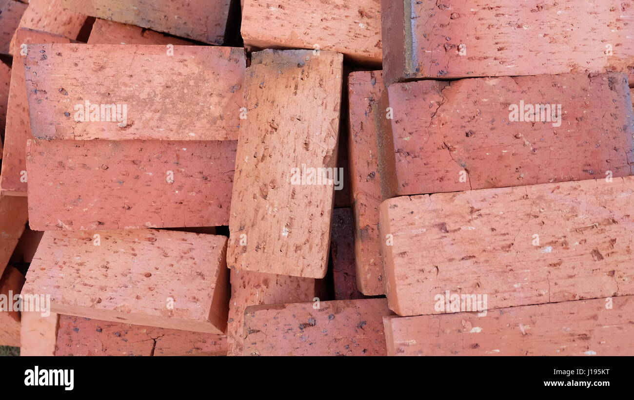 Bricks stacked and arranged together side by side Stock Photo - Alamy