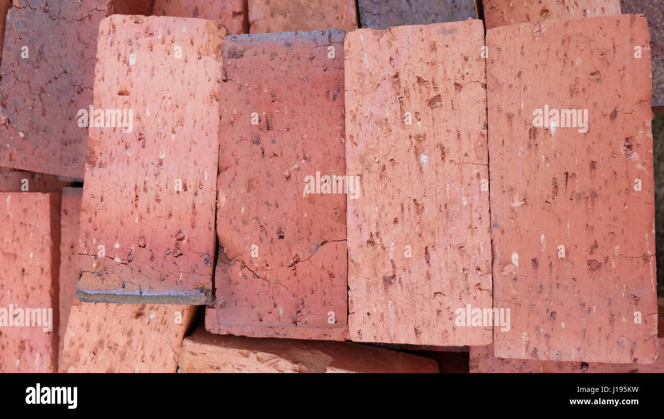 Bricks stacked and arranged together side by side Stock Photo - Alamy