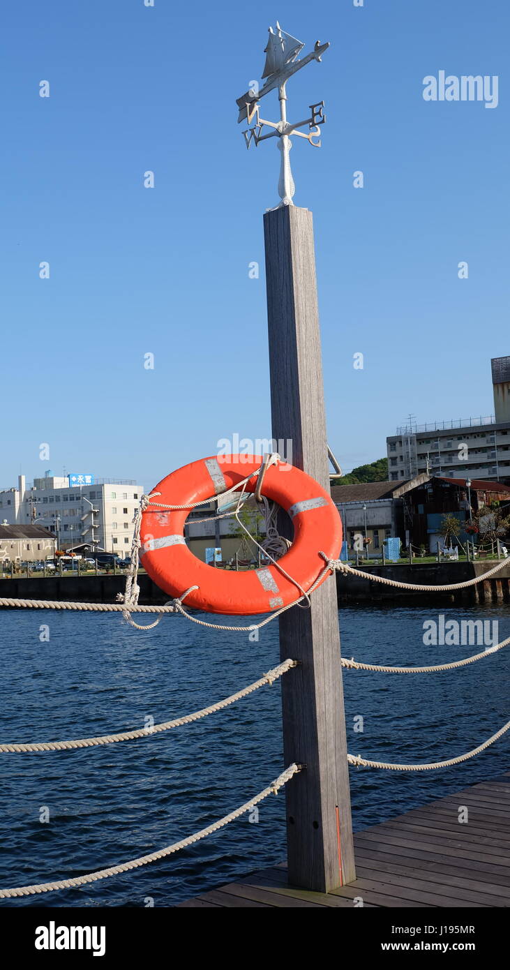 A lifebuoy, also known as ring buoy, lifering, lifesaver, life donut ...