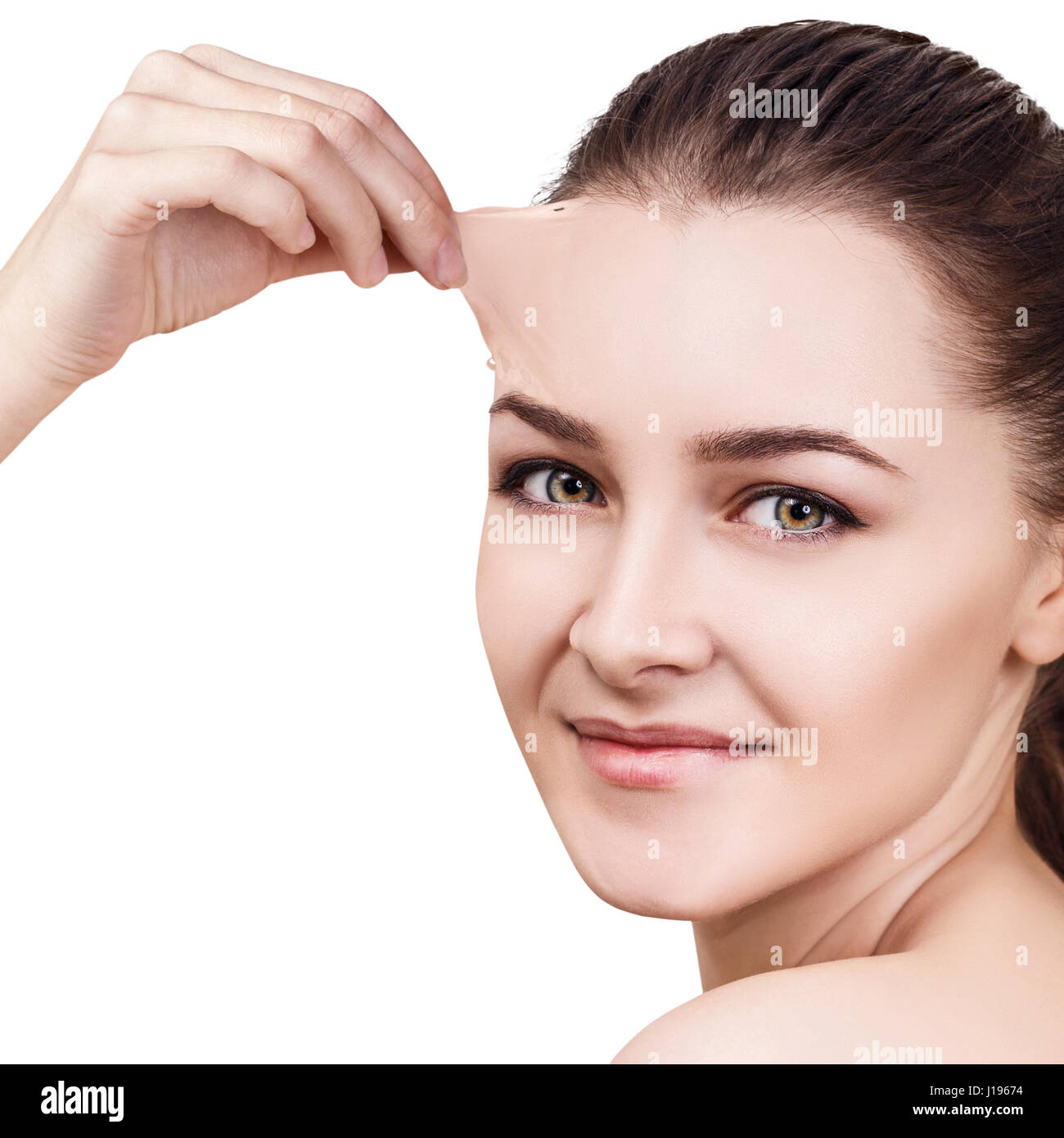 Woman remove her old dry skin from face Stock Photo - Alamy