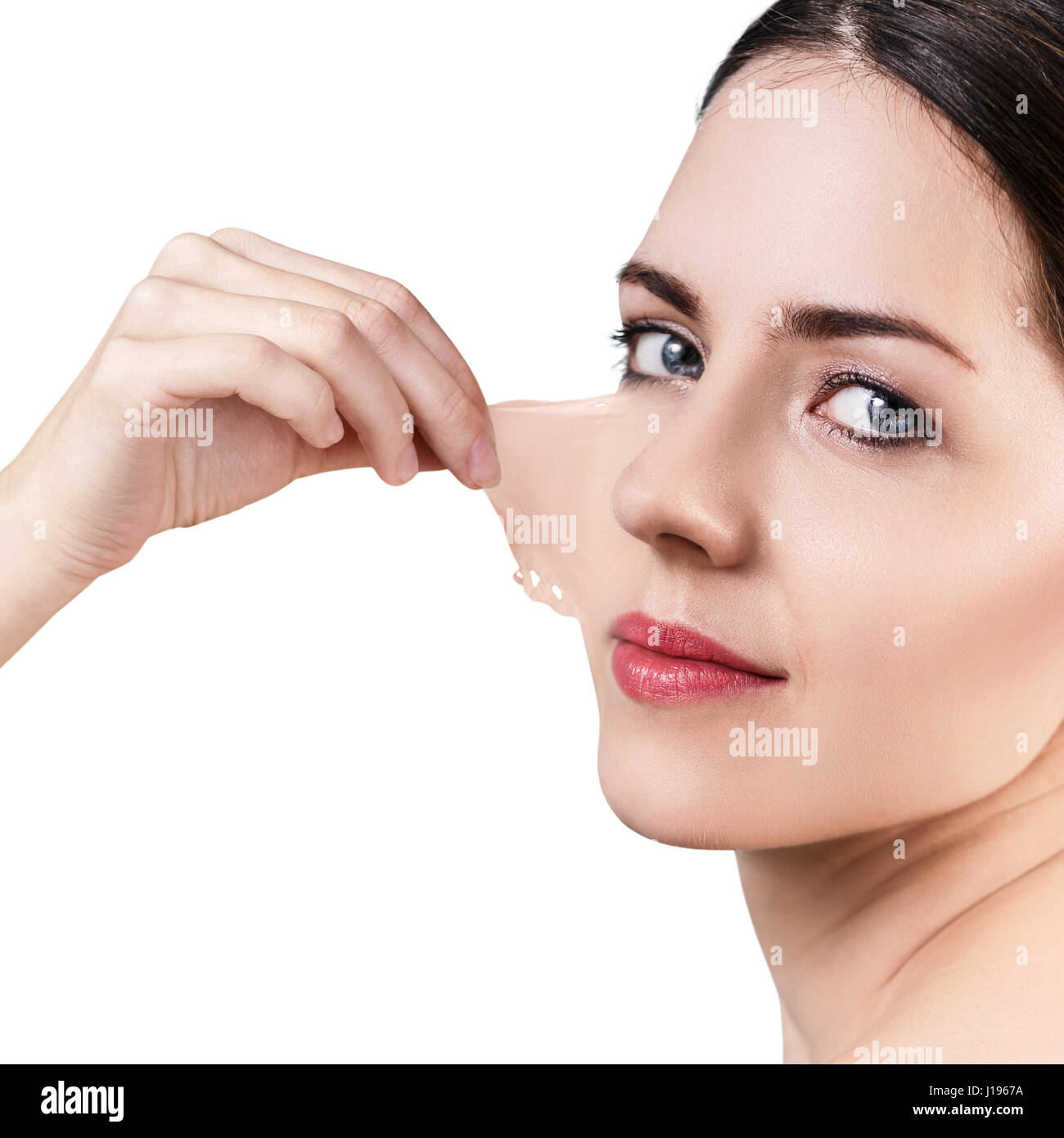 Woman remove her old dry skin from face Stock Photo - Alamy