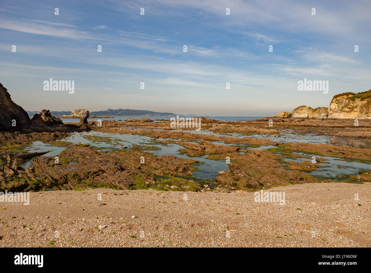 Low tide on a northwestern beach in Spain Stock Photo - Alamy